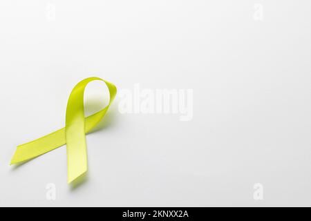 Composition of light green std health awareness ribbon, on white ...