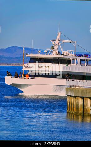 Monterey, CA., USA - 18th November, 2022 Tourists and locals paddle ...