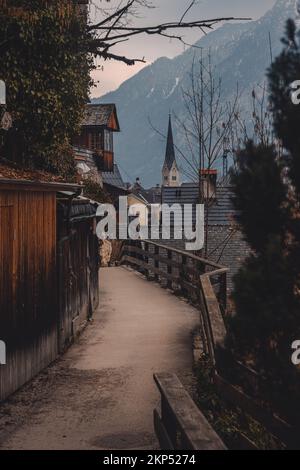 traditional chalets roofs with wooden fence in Hallstatt street in ...