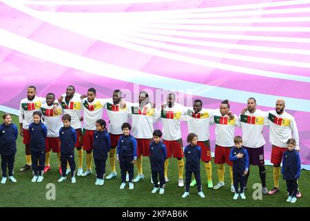 Cameroon and Serbia players line up before the FIFA World Cup Group G ...