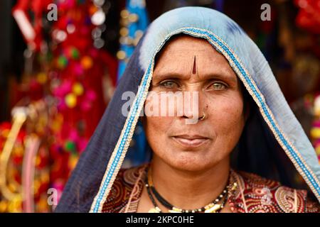 An Indian old kalbelia tribal woman. This snake charming tribe used to ...