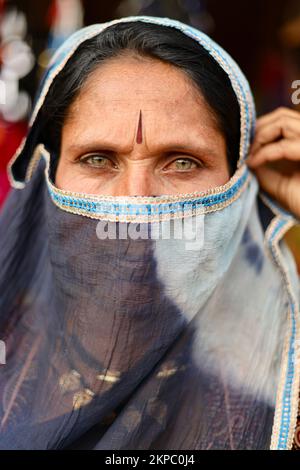 An Indian old kalbelia tribal woman. This snake charming tribe used to ...