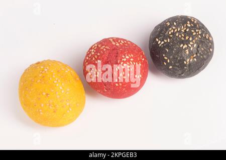Colorful seasoned bread resting on a white background Stock Photo - Alamy