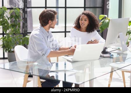 Software developers team discussing algorithms on computer screen Stock Photo - Alamy