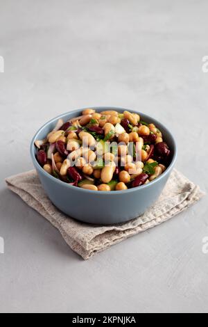 Homemade Three Bean Salad in a Bowl on a black background, top view ...