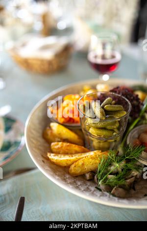 Different tasty vegetables and mushrooms in frying pan on light grey ...