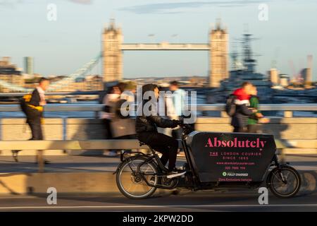 An Absolutely cycle courier riding an e-cargo bike, London, UK Stock ...