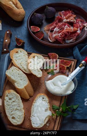 Making ham sandwiches and tapas ingredients, CLOSE UP Stock Photo - Alamy