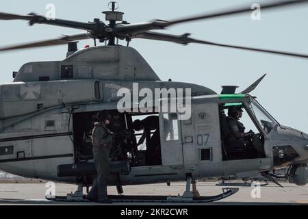 Marines with Marine Light Attack Helicopter Squadron (HMLA) 267 land a ...