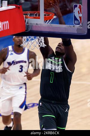 Minnesota Timberwolves guard Anthony Edwards (5) shoots over Indiana ...