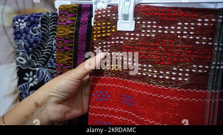 close up ulos cloth in the fashion store market. Ulos is the ...