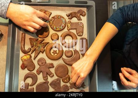 Top view of gingerbread cookies before baking on baking tray Stock ...