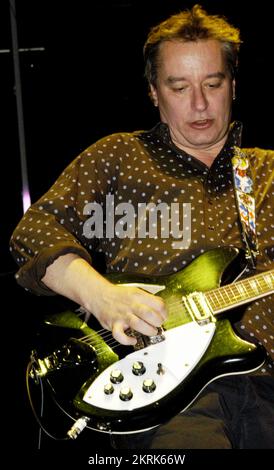Guitarist & songwriter Peter Buck of the rock band R.E.M. is shown ...