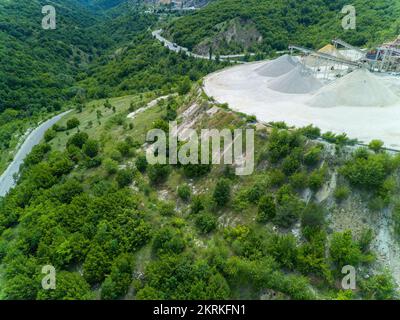 Mining with help of modern technology on slope of low mountain, in ...