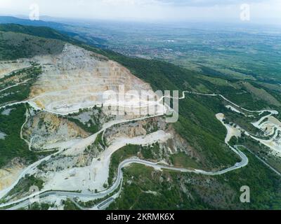 Mining with help of modern technology on slope of low mountain, in ...