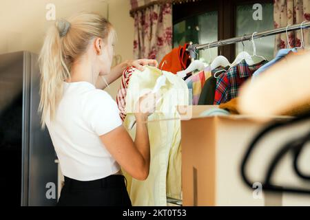 Used clothes resale concept Stock Photo - Alamy