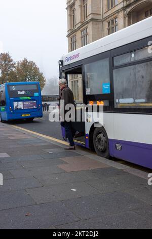 Man getting off of a bus in Puebla, Mexico Stock Photo - Alamy