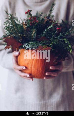 Rich autumn bouquet in the hands of a girl on a light background Stock ...