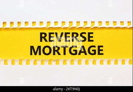 Reverse mortgage symbol. Concept words Reverse mortgage on wooden ...