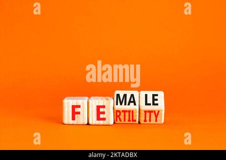 Female fertility symbol. Concept word Female fertility on wooden cubes ...