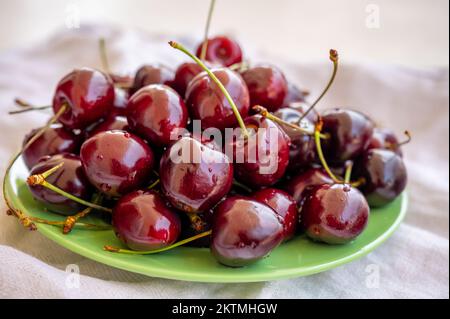 Giant french fresh ripe black cherries, new harvest, ready to eat close ...