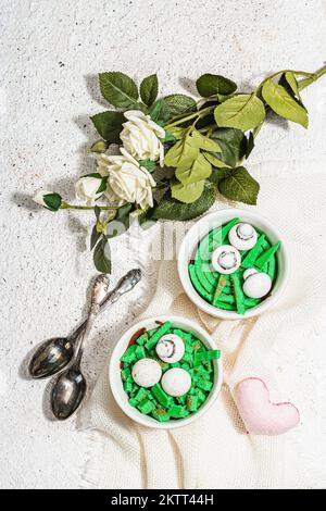 Vegan dessert with mushroom decor. Romantic arrangement, roses bouquet ...