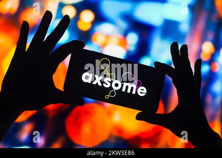 In this photo illustration, the Axsome Therapeutics logo is displayed ...