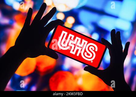 In this photo illustration, Universal Health Services, Inc. (UHS) logo ...