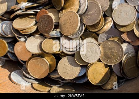 Old metal coin collectiions of various currencies Stock Photo - Alamy