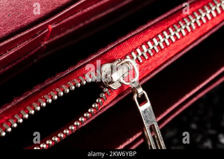 Extreme close-up of metal zipper. Macro photography, tailoring or ...