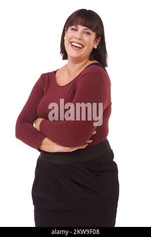 A plus size woman exudes confidence as she poses on her stomach ...