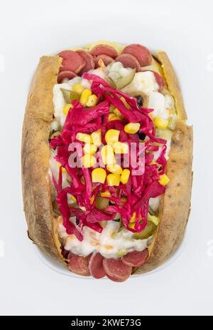 Kumpir, Turkish baked potato with cheese, corn, sausage, ketchup ...