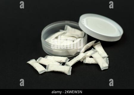 Swedish snus sachets. Open box with snus on a black background Stock ...