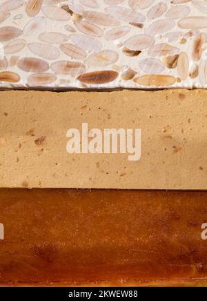 Three type of Spanish turron, hard almond, soft almond and burnt egg ...
