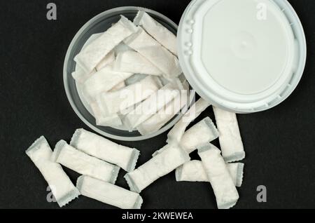 Swedish snus sachets. Open box with snus on a black background Stock ...