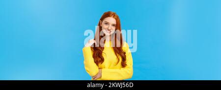 Curious creative redhead attractive modern young curly-haired female ...