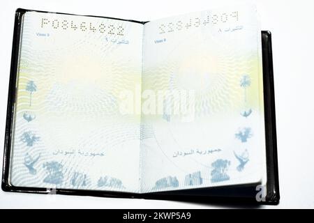 The Republic of Sudan passport with a gilded falcon in the center of ...