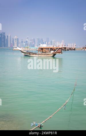 Traditional dhow boat docked in Doha, Qatar Stock Photo - Alamy