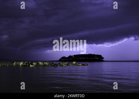 Lightning is seen over Rab island, Croatia Stock Photo - Alamy