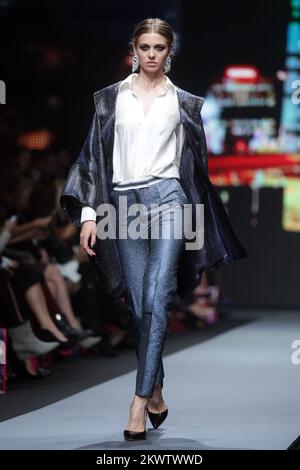 A model on the catwalk during the Aman show during Fashion week in ...