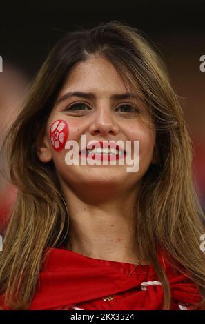 Ar Rayyan, Qatar, 30th November 2022. A pitch invader cartwheels across ...