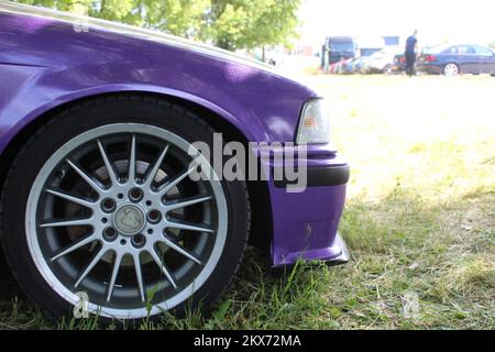 car on a car show with a beutiful paint job and rims Stock Photo - Alamy