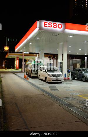 HONG KONG - APRIL 15, 2015: Esso fuel station at evening. Esso is an international trade name ...