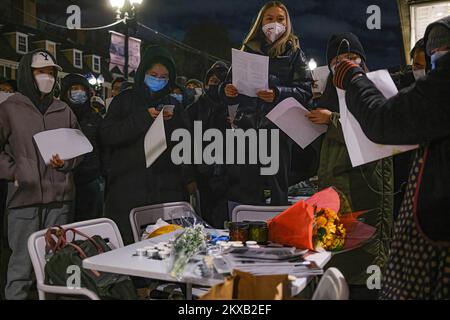Protesters hold blank papers during a demonstration against China's ...