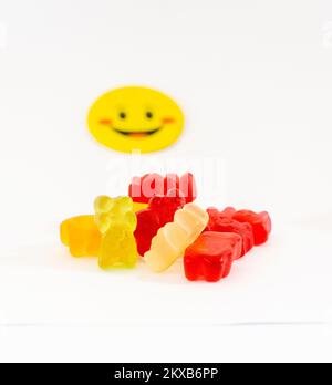 Colorful smiley gummy candy isolated on a white background Stock Photo ...