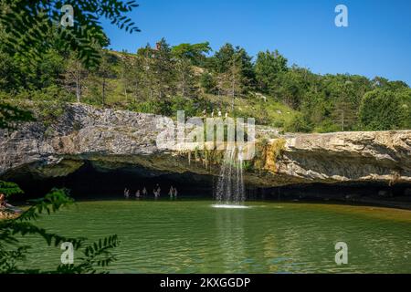 People enjoy at Zarecki krov (Zarecje's roof) waterfall,near Pazin ...