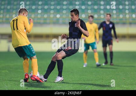 Svajunas Cyzas of Lithuania and Kristijan Bistrovic of Croatia competer ...