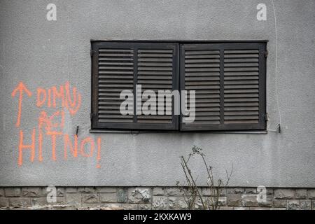 Firefighters repairing the damage on the roof which was damaged in ...