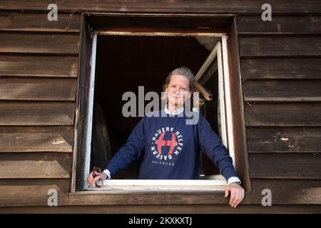 Austrian Doraja Eberle seen on the window of the house , in village of ...