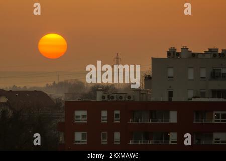 Photo taken on Feb 24, 2021 shows the sunset above city , in Zagreb ...